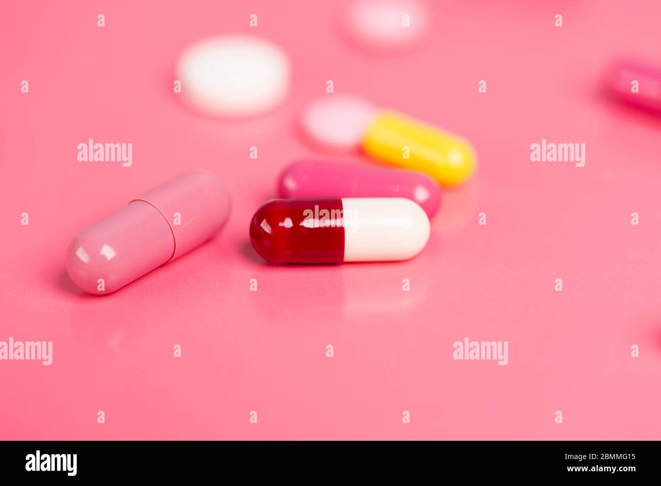 Different medications. Various pill and capsules. One-color backdrop ...
