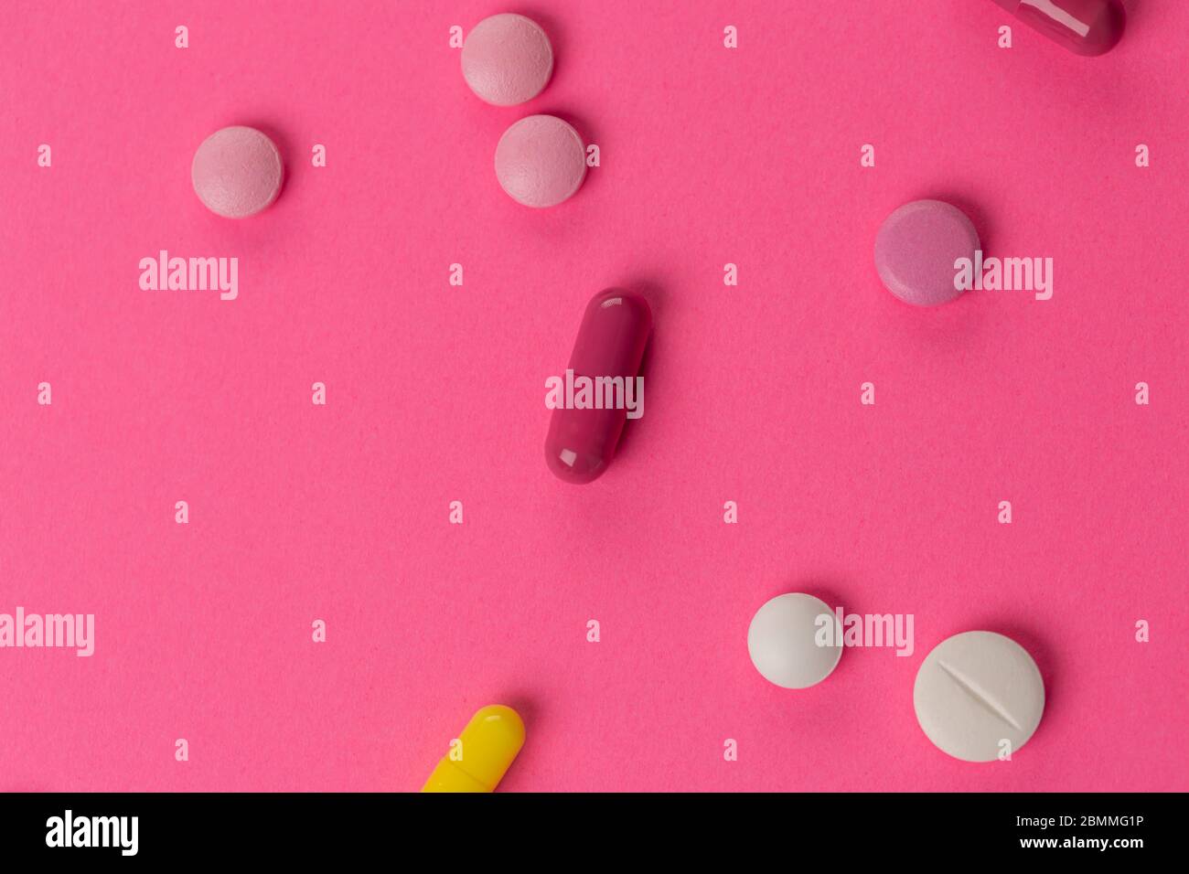 Different medications. Various pill and capsules. One-color backdrop ...