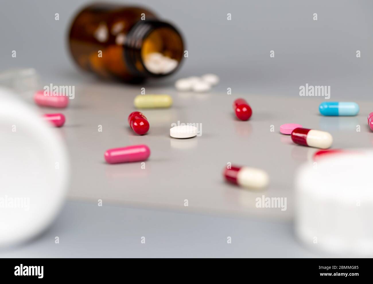 Different medications. Various pill bottles. One-color backdrop Stock ...