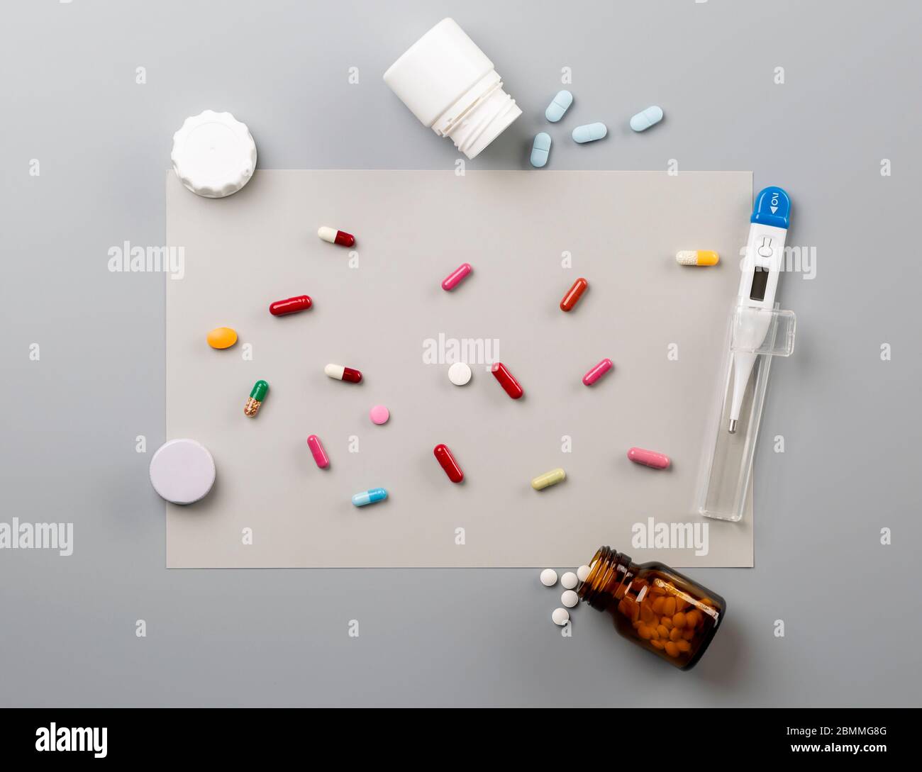 Medical set-up. Different pills, capsules.Digital thermometer. Pill ...