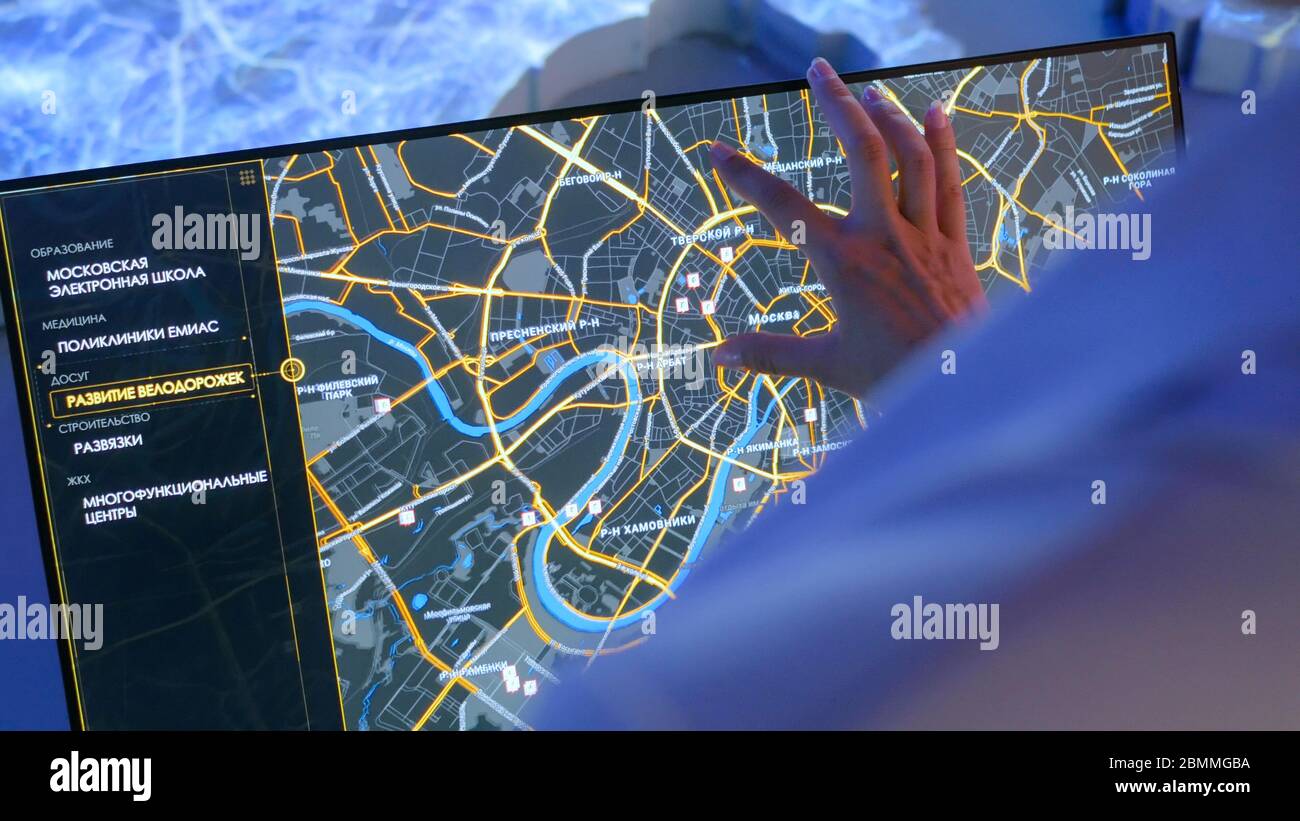 MOSCOW, RUSSIA - July 30, 2018: Smart City Exhibition. Woman using ...