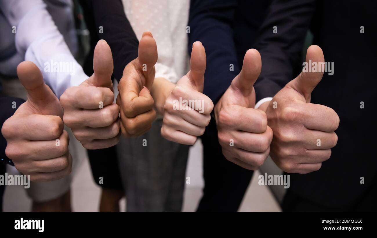 Diverse hands thumbs up hi-res stock photography and images - Alamy