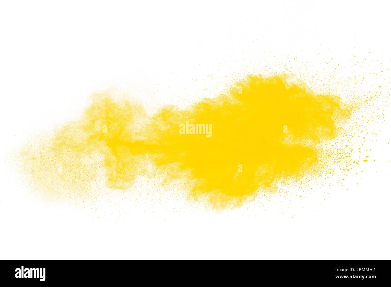 Yellow dust particles explosion on white background.Yellow powder dust ...