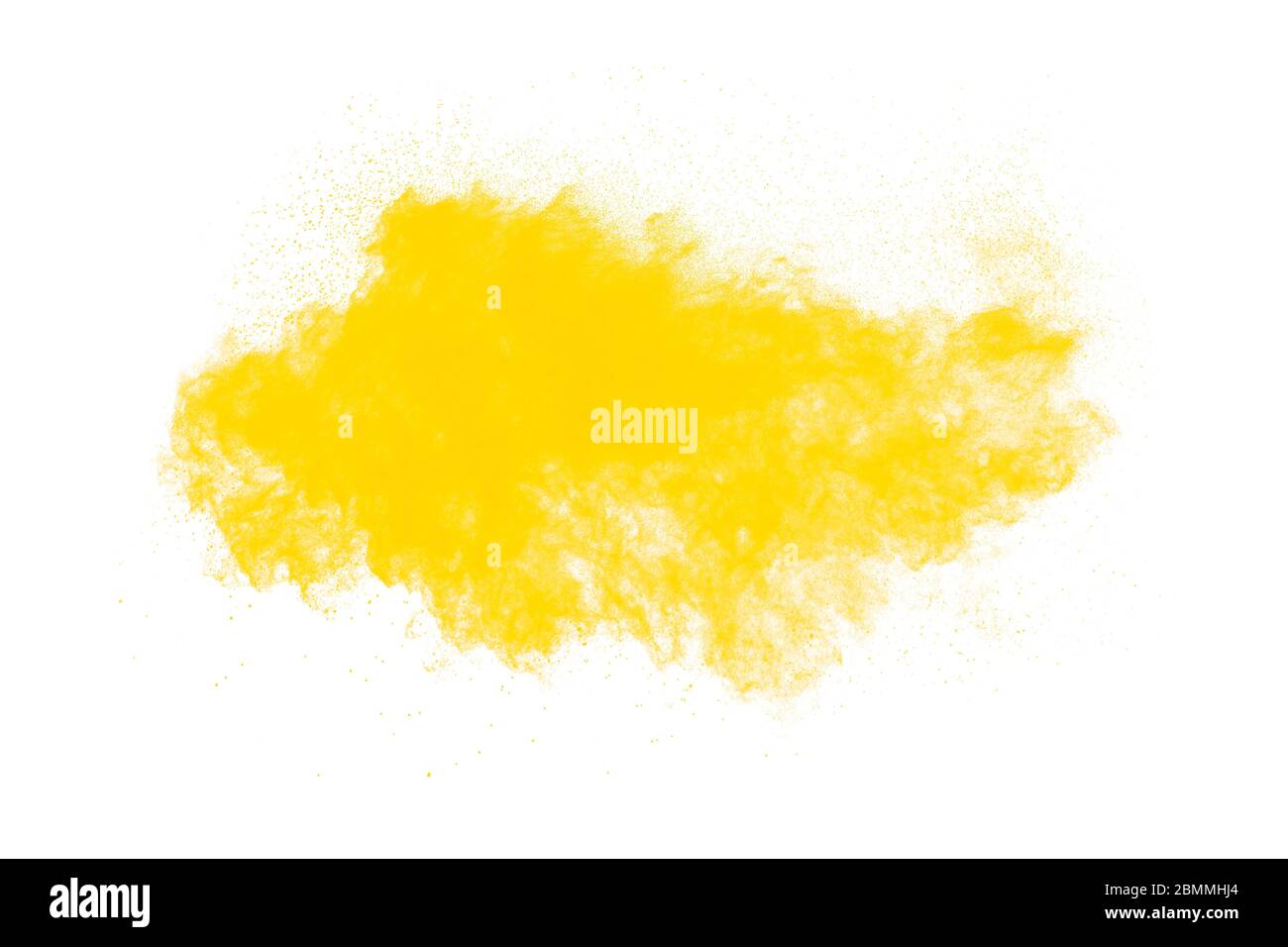 Yellow dust particles explosion on white background.Yellow powder dust ...
