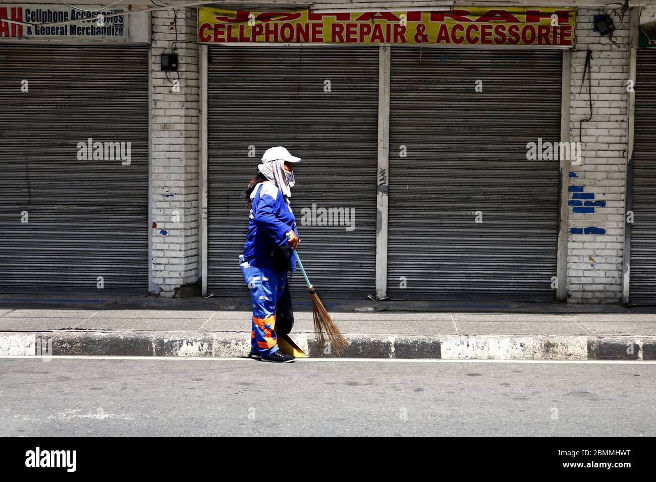 Antipolo City, Philippines - May 7, 2020: Street cleaner sweeps in ...