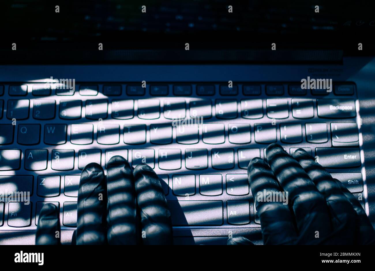 Black glove typing hi-res stock photography and images - Alamy