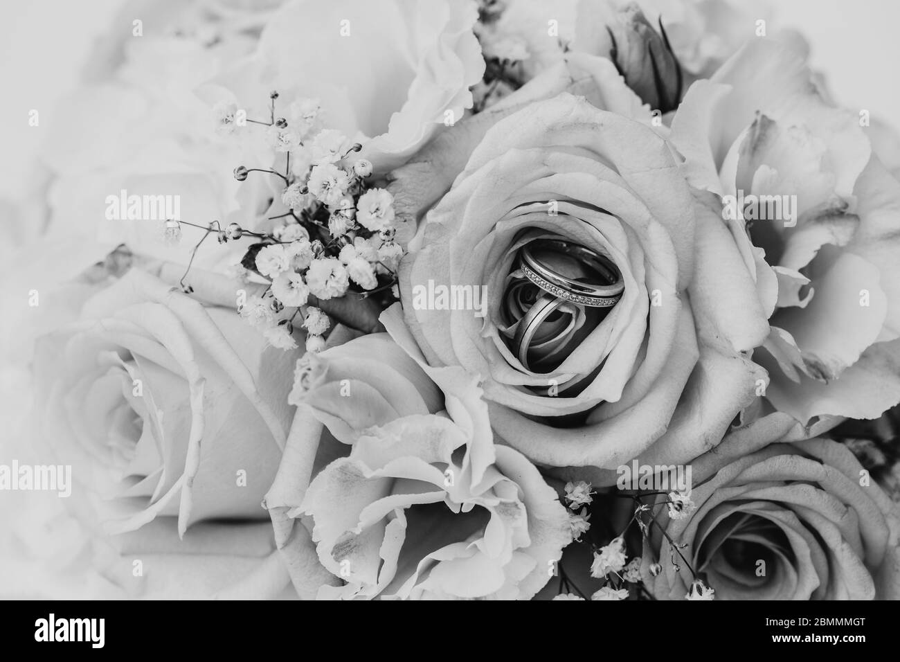 Commitment ceremony rings Black and White Stock Photos & Images - Alamy