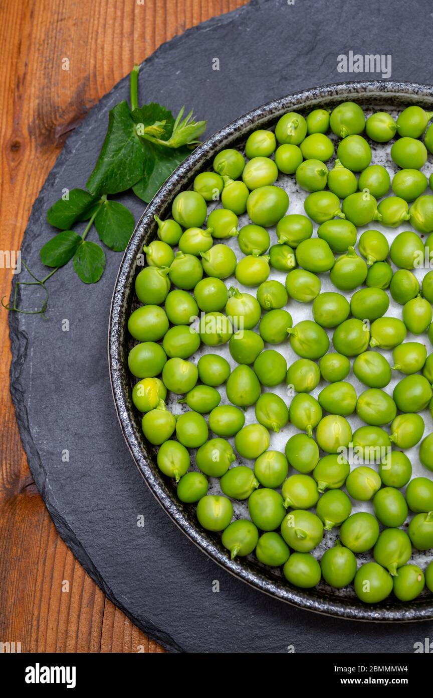 New harvest of fresh ripe green peas legumes Stock Photo - Alamy