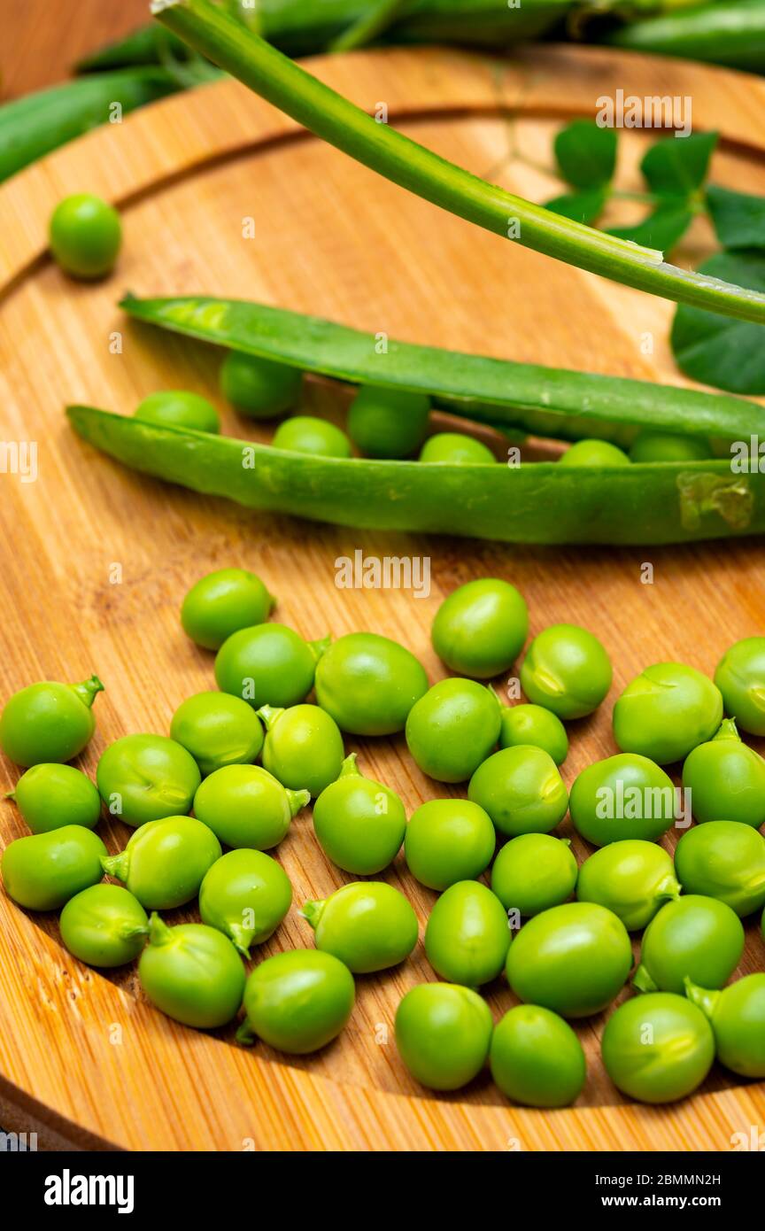 New harvest of fresh ripe green peas legumes Stock Photo - Alamy