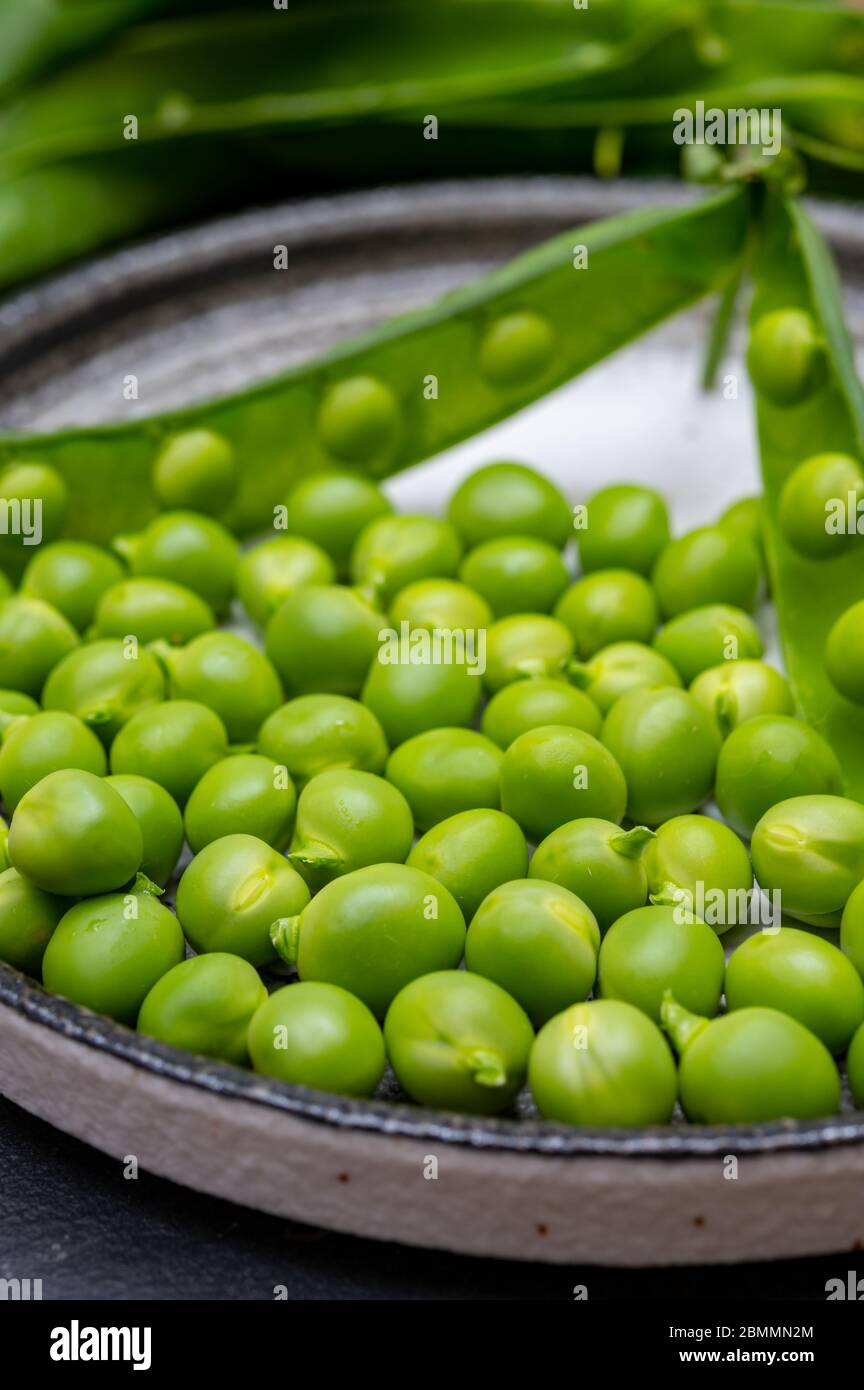 New harvest of fresh ripe green peas legumes Stock Photo - Alamy