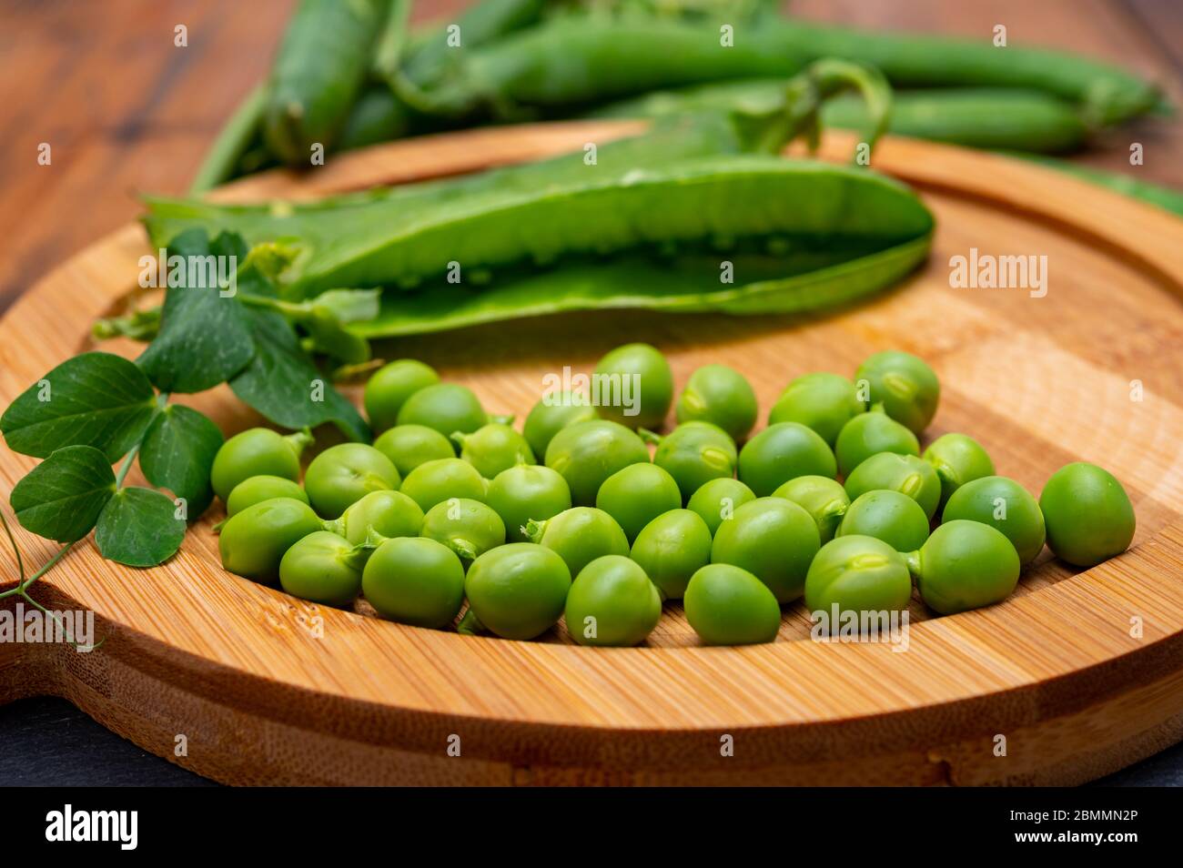 New harvest of fresh ripe green peas legumes Stock Photo - Alamy