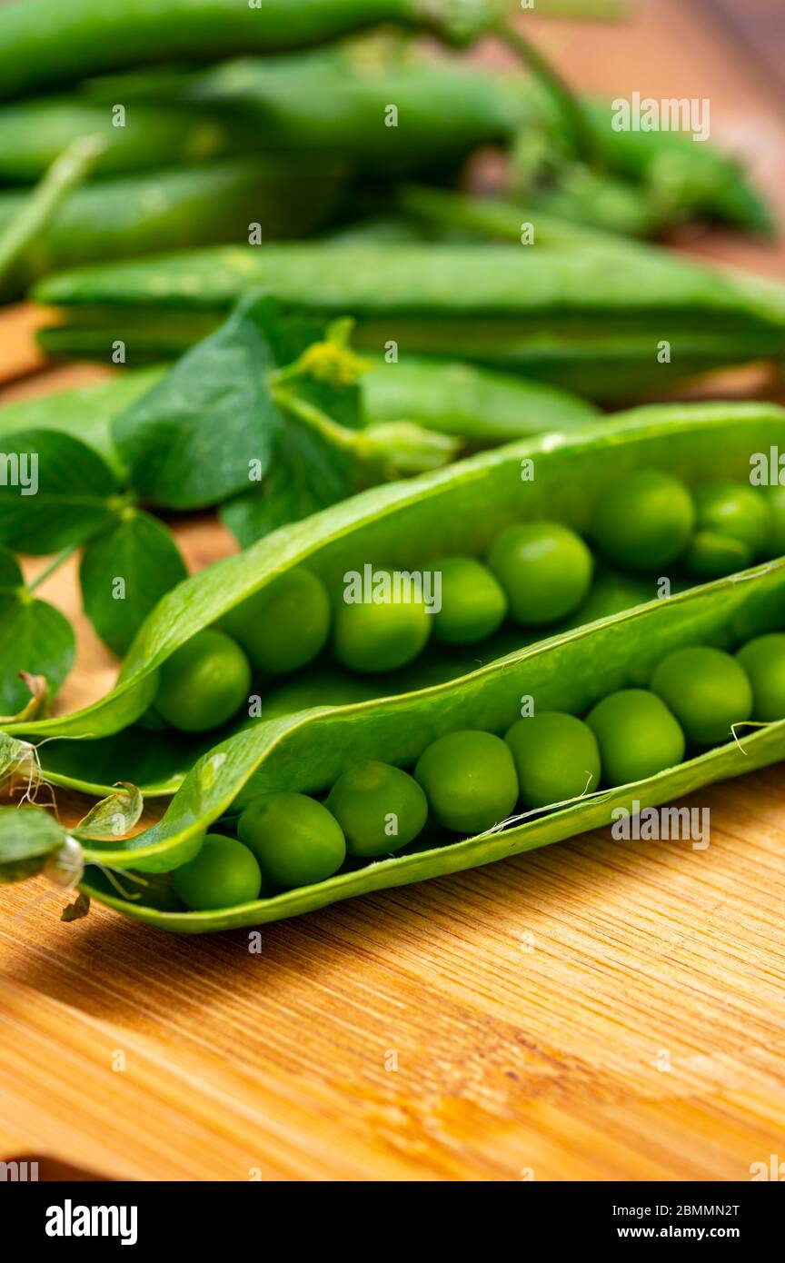 New harvest of fresh ripe green peas legumes Stock Photo - Alamy