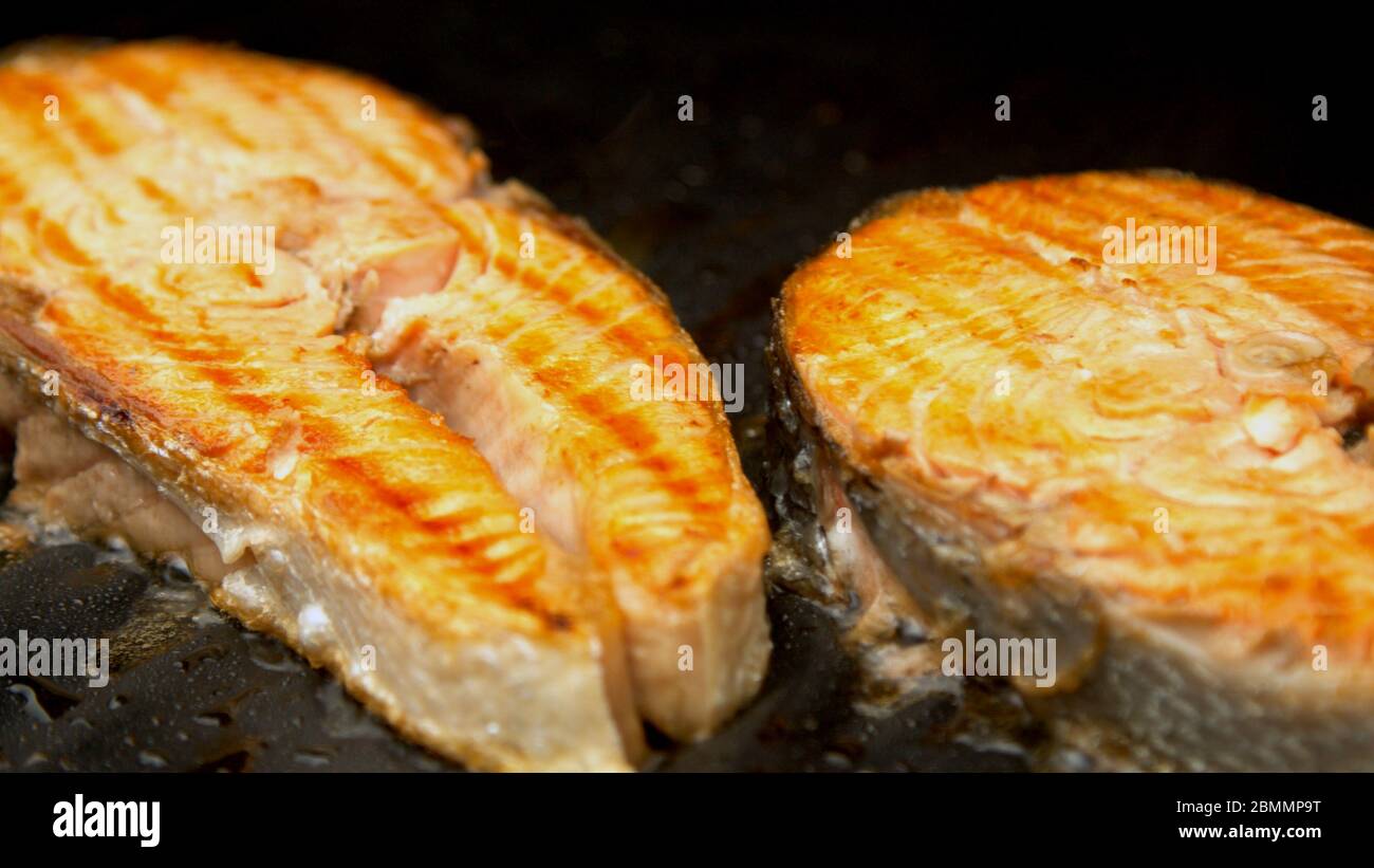 Close-up of of fish cuts being grilled Stock Photo - Alamy
