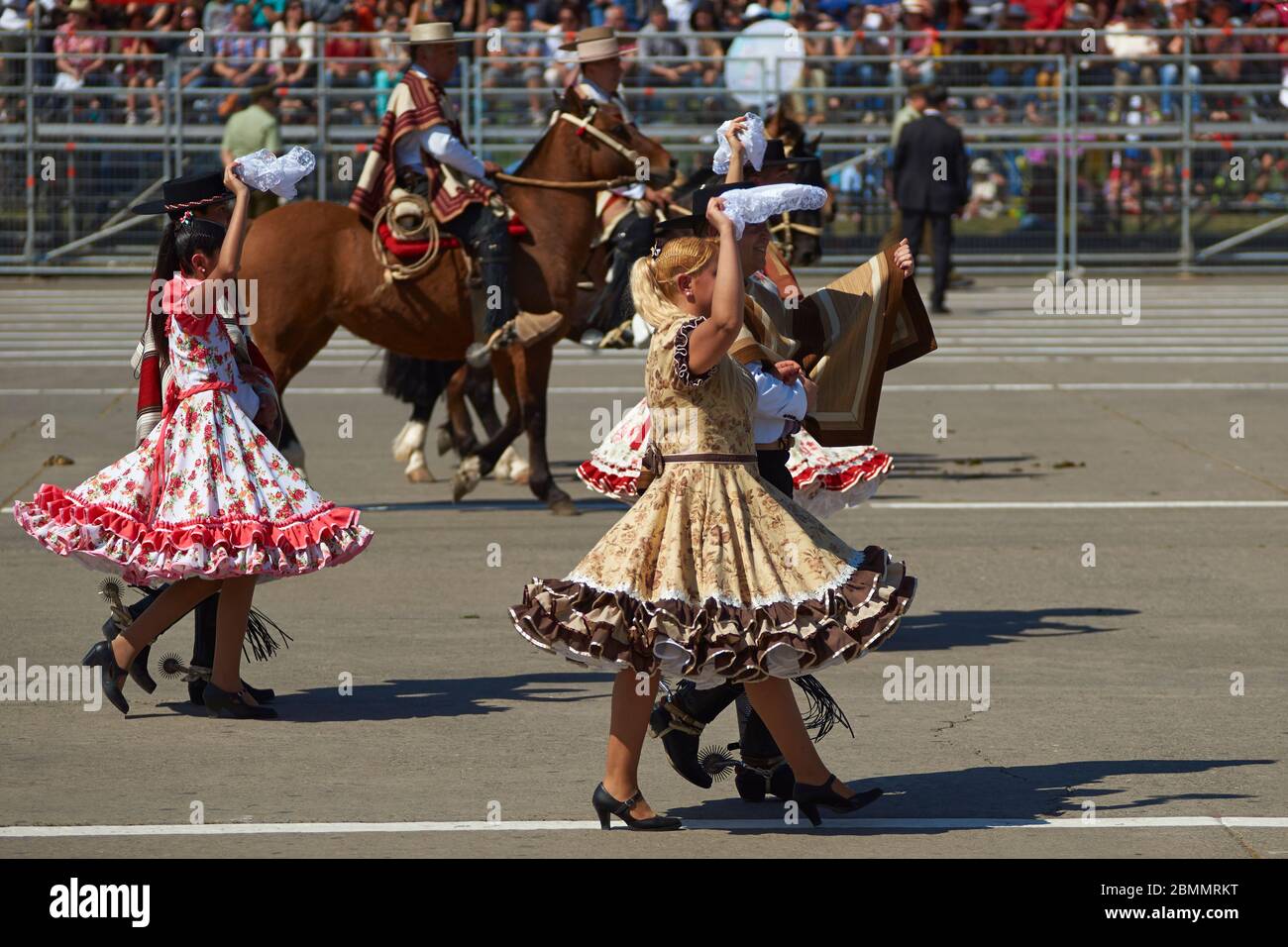 Traditional cueca dance group performing at the annual Military parade ...