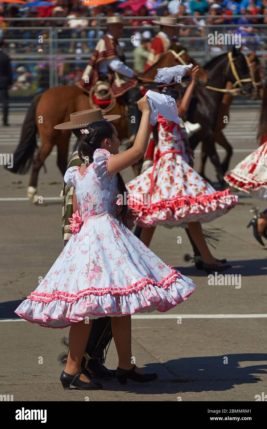 Traditional cueca dance group performing at the annual Military parade ...