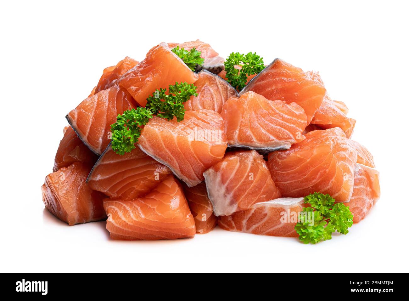 Fresh salmon fillet cubes isolated on white Stock Photo - Alamy