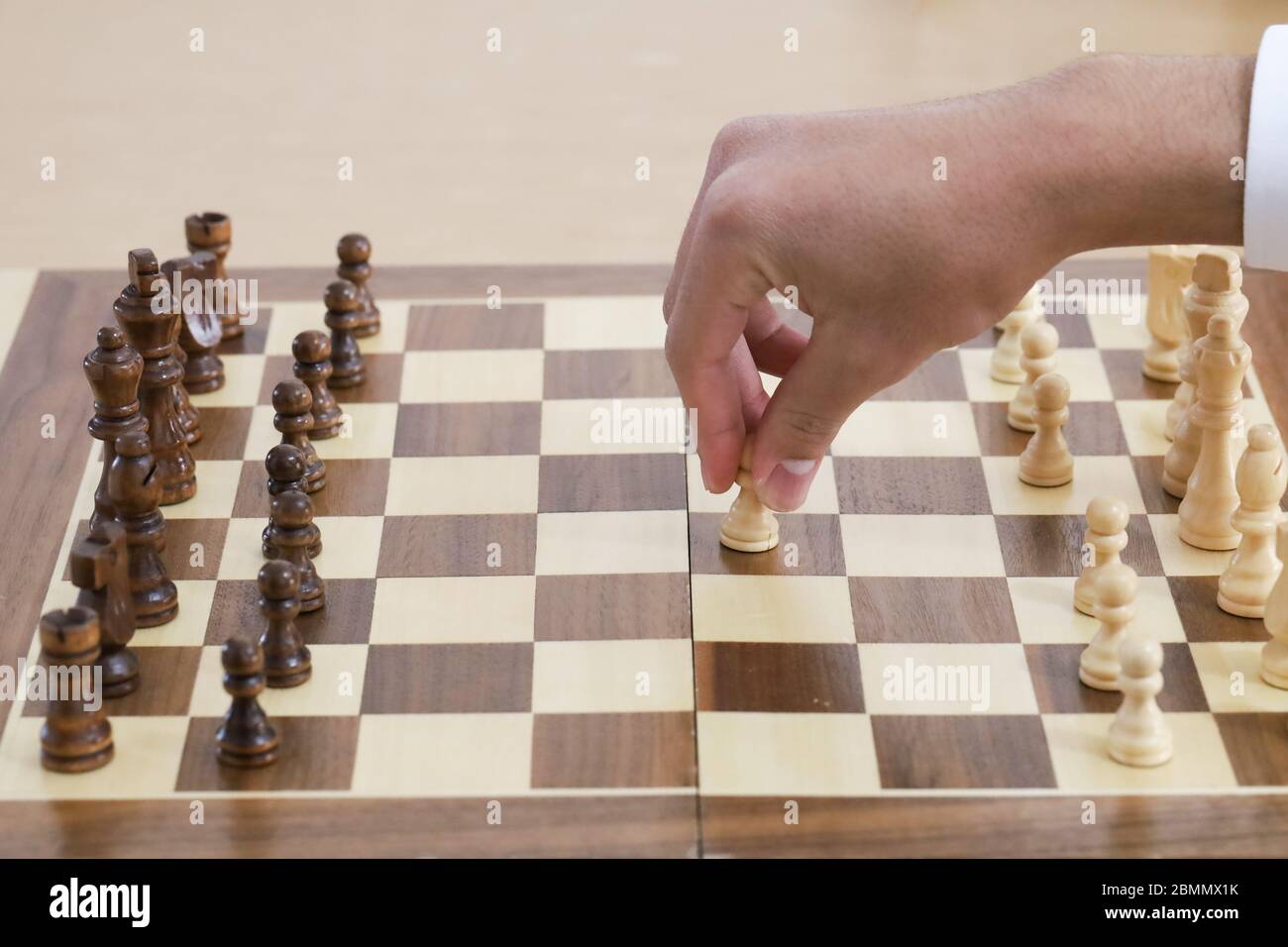 An open chess game on the table Stock Photo - Alamy
