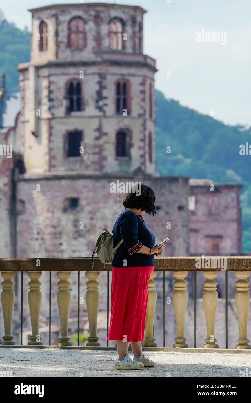 Heidelberg, Germany. 10th May, 2020. A visitor stands in the castle ...