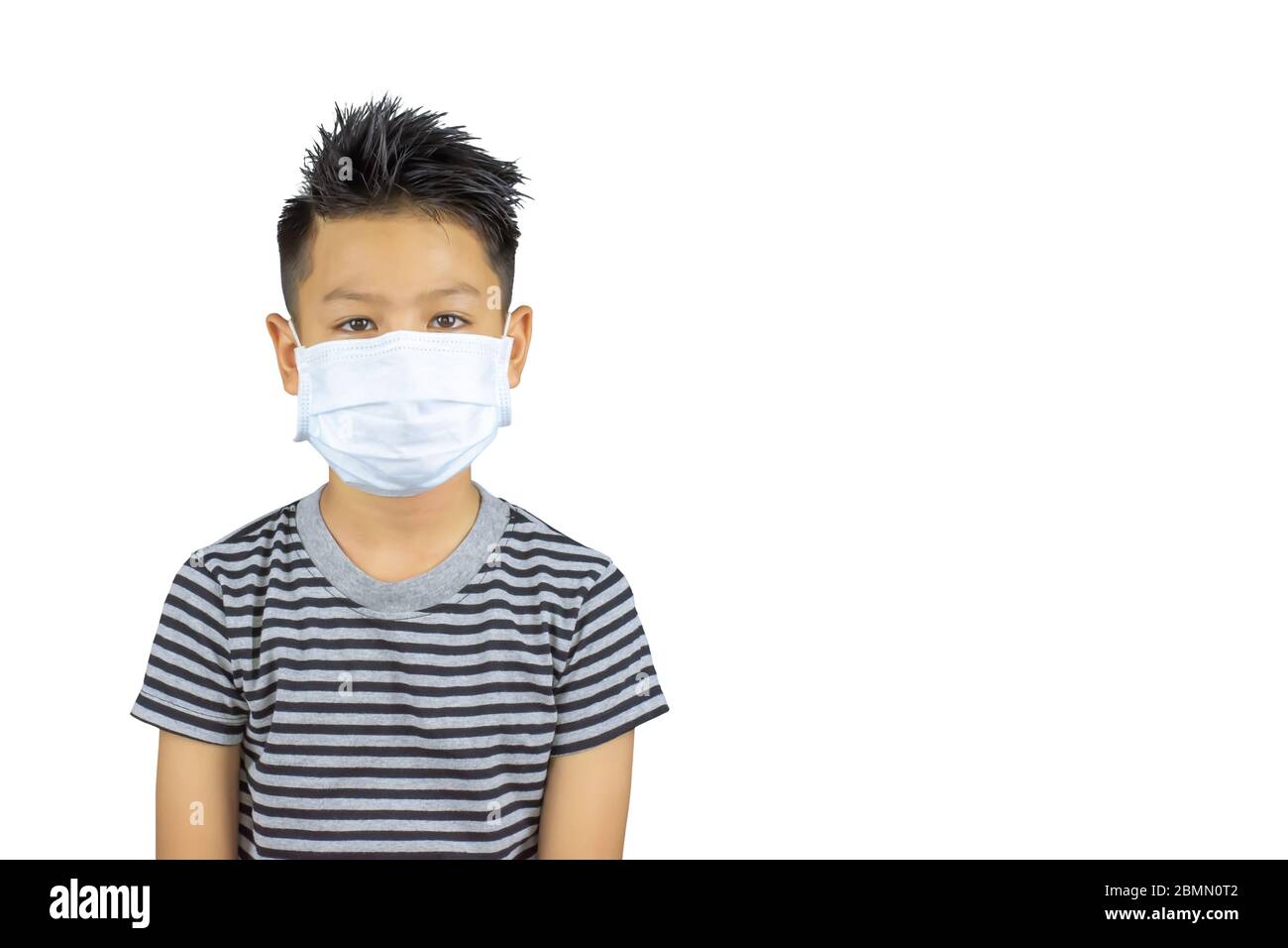 Isolated Asian boy wearing a mask on a white background with clipping ...