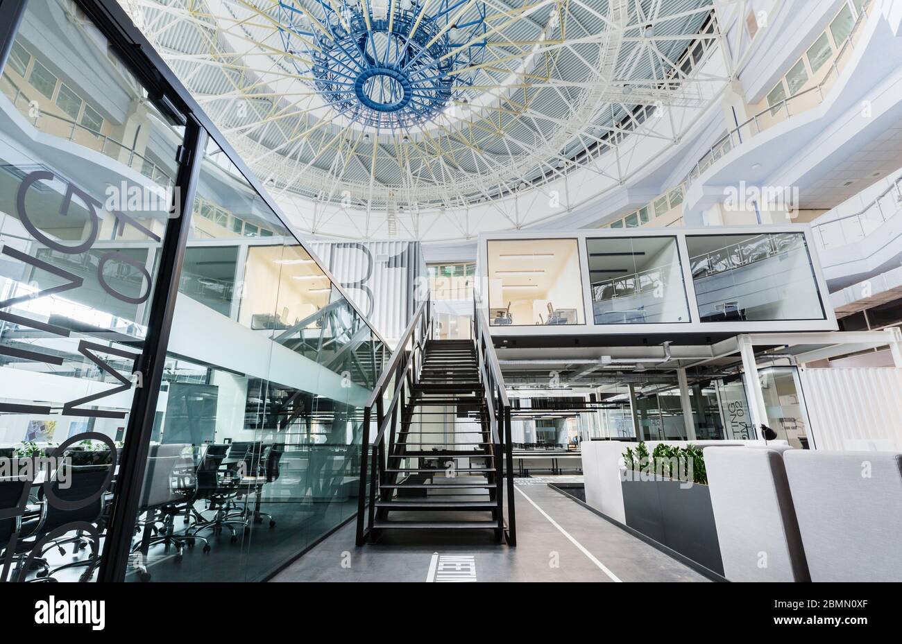 Modern open space office with high ceilings and dome Stock Photo - Alamy