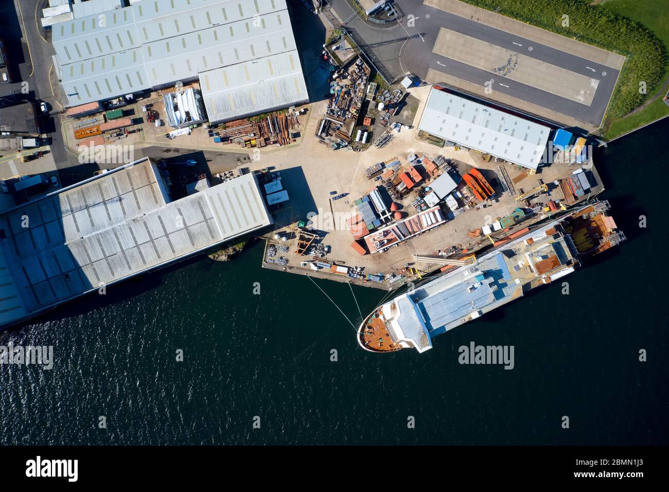 Shipbuilding construction ship aerial view at shipyard harbour with ...