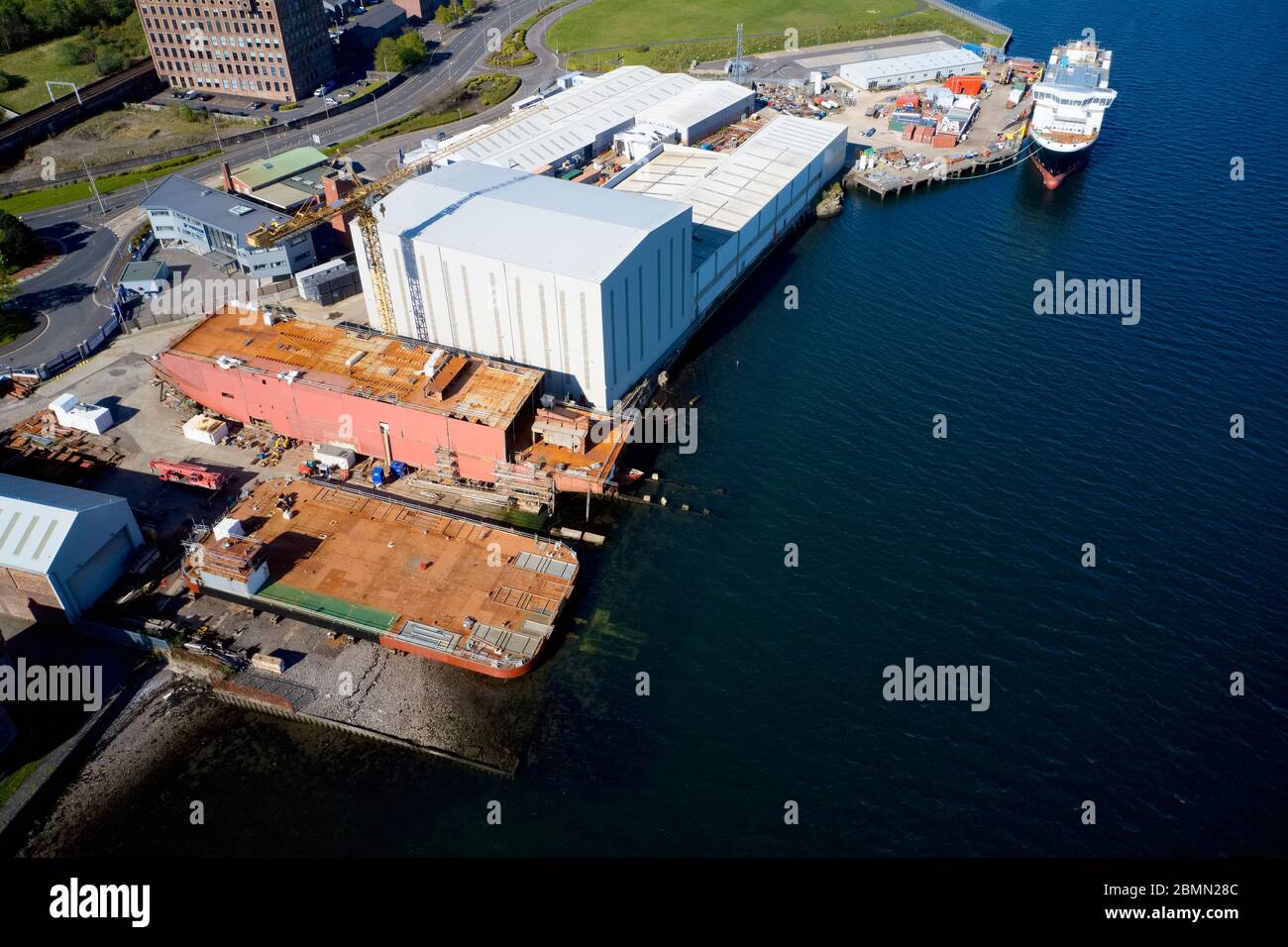 Shipbuilding construction ship aerial view at shipyard harbour with ...