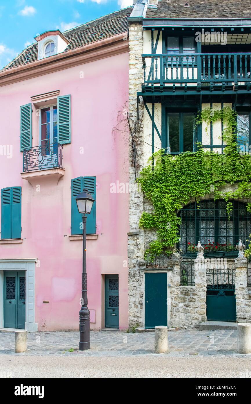 Paris, France, famous pink house and buildings in Montmartre, in a ...