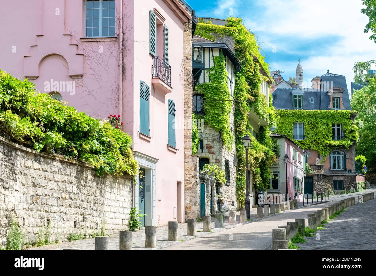 Paris, France, famous pink house and buildings in Montmartre, in a ...