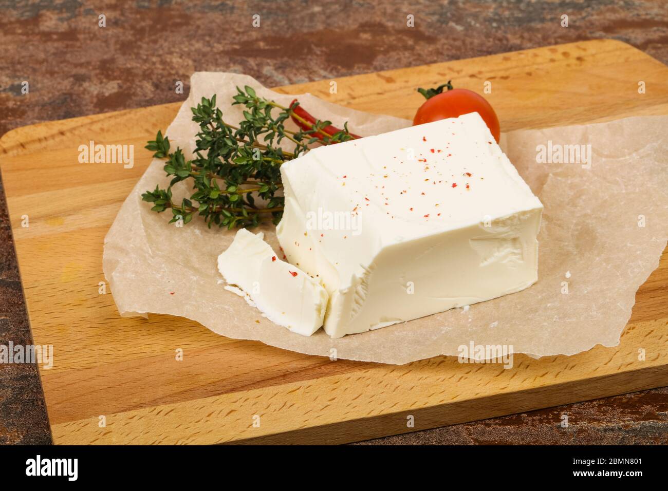 Traditional Feta Cheese served thyme Stock Photo - Alamy
