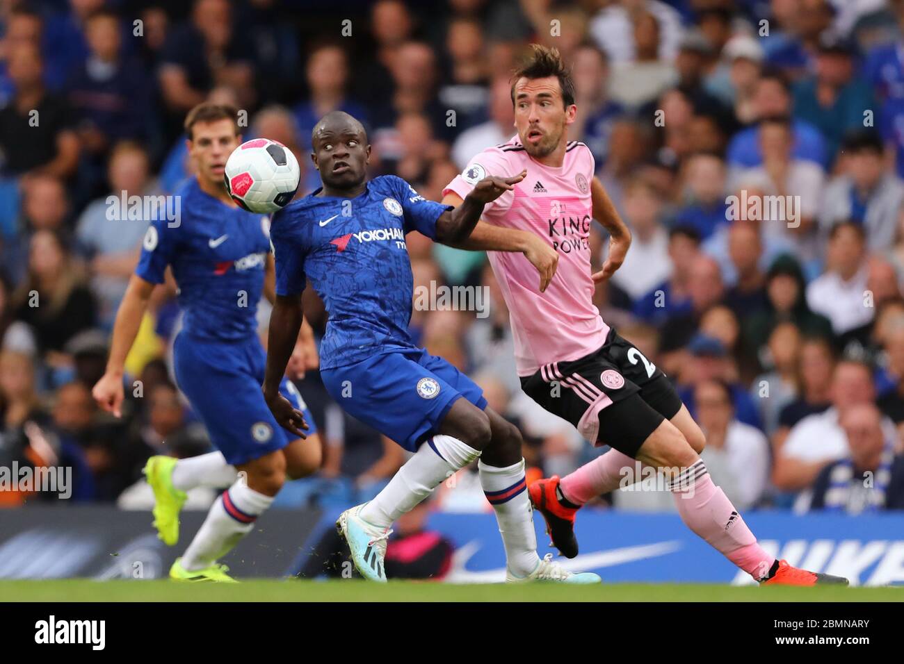 Ngolo Kante of Chelsea and Christian Fuchs of Leicester City in action ...
