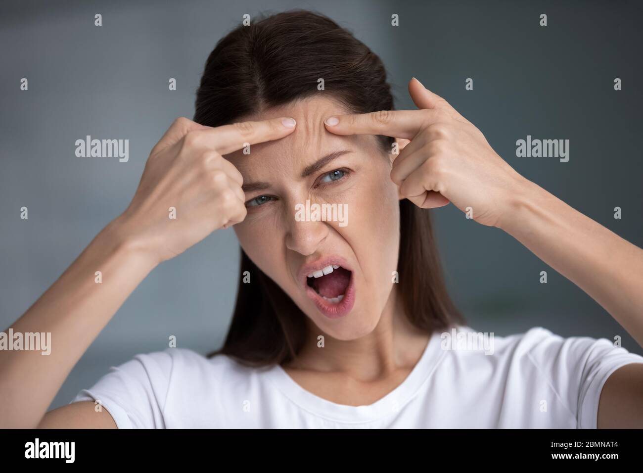 Person push acne hi-res stock photography and images - Alamy