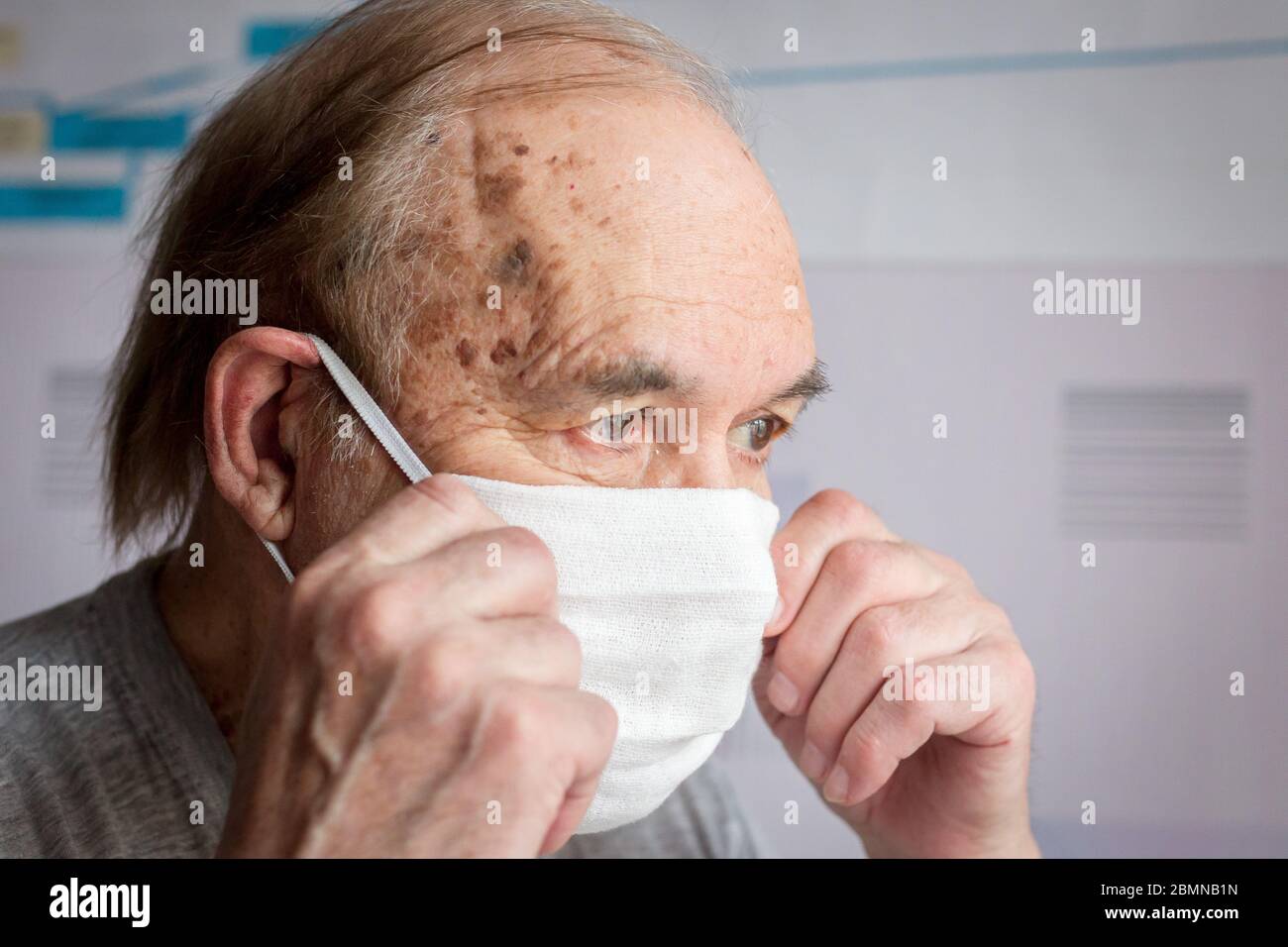 Elderly portrait man at home isolation Stock Photo - Alamy