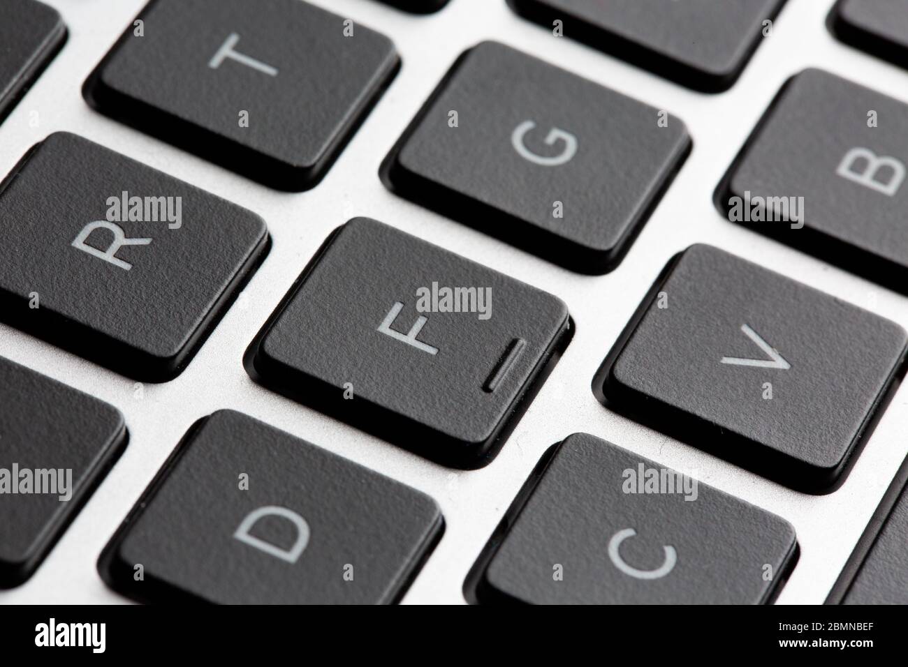 Close up computer keyboard keys with bokeh effect shallow depth of ...