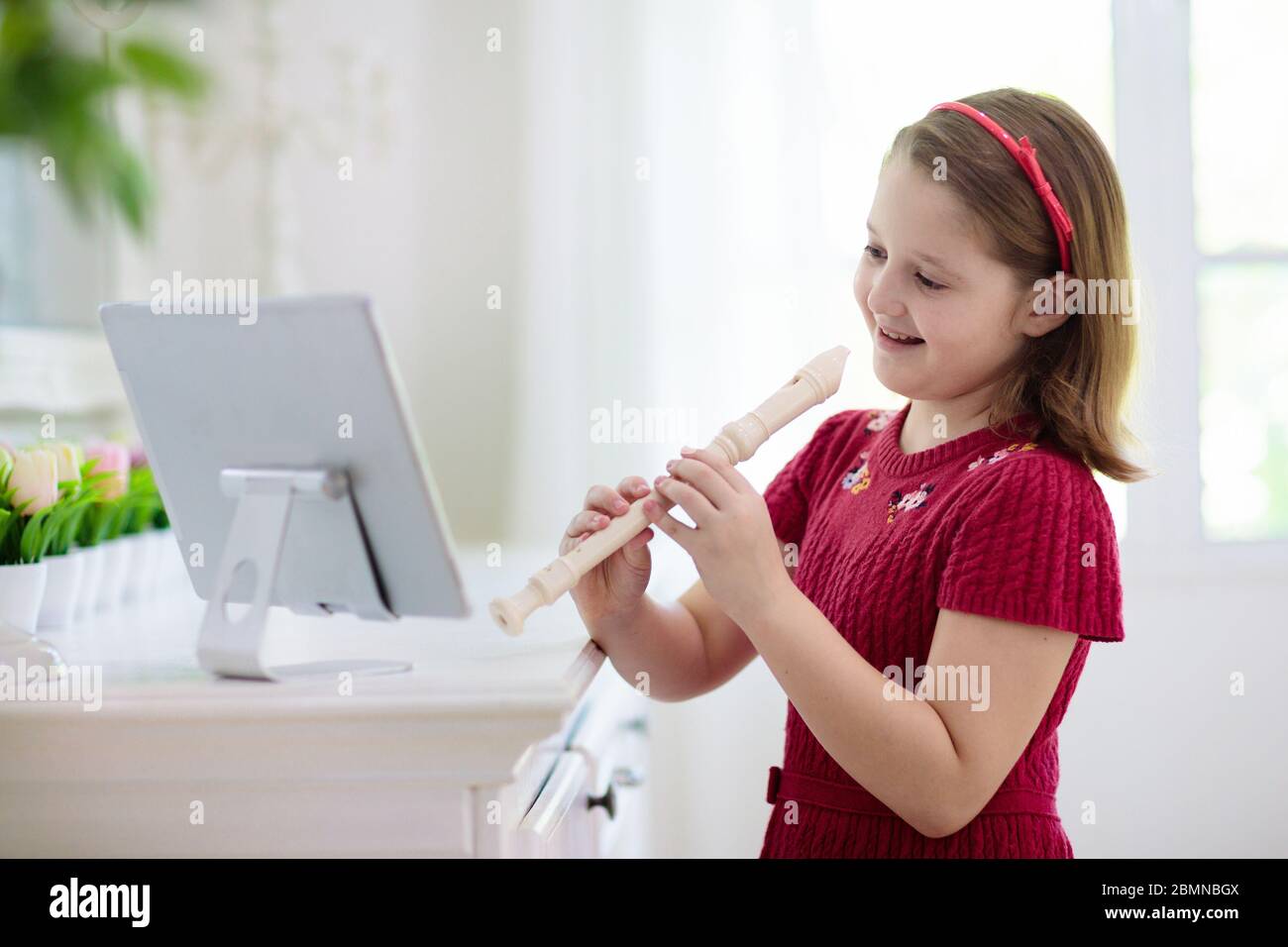 Student playing flute hi-res stock photography and images - Alamy