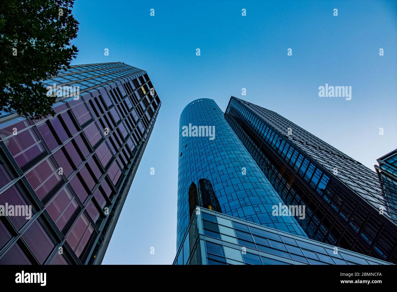 View to the tall glass buildings from the street road Stock Photo - Alamy