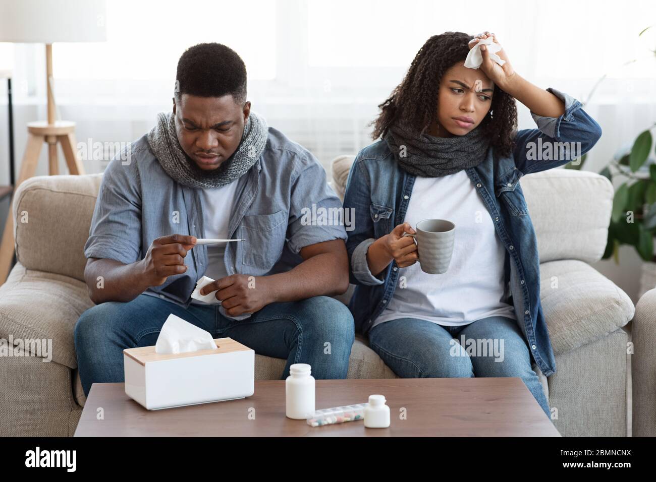 Treating Coronavirus At Home. Sick Black Couple Suffering From Covid-19 ...