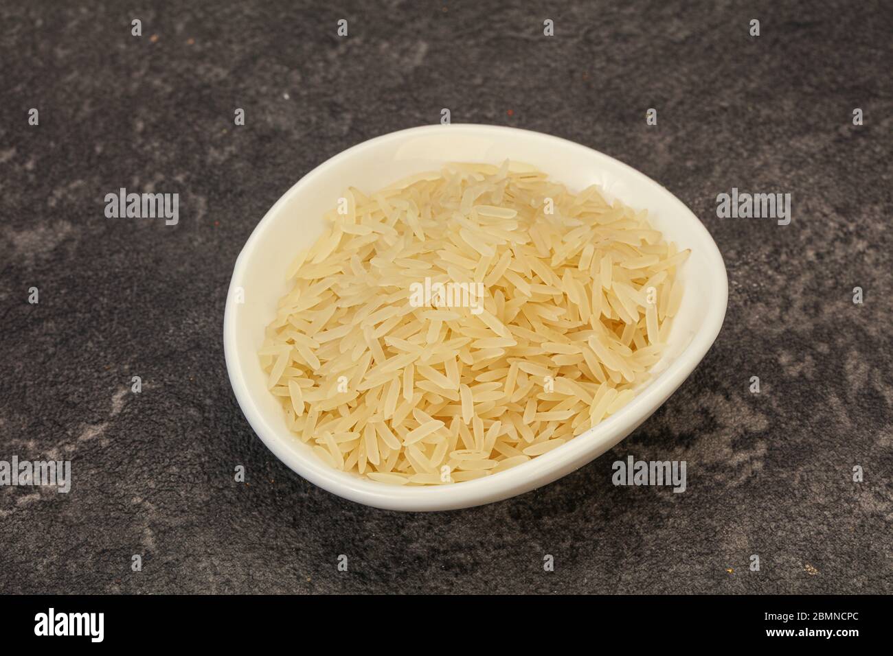 Raw Indian basmati rice in the bowl Stock Photo - Alamy