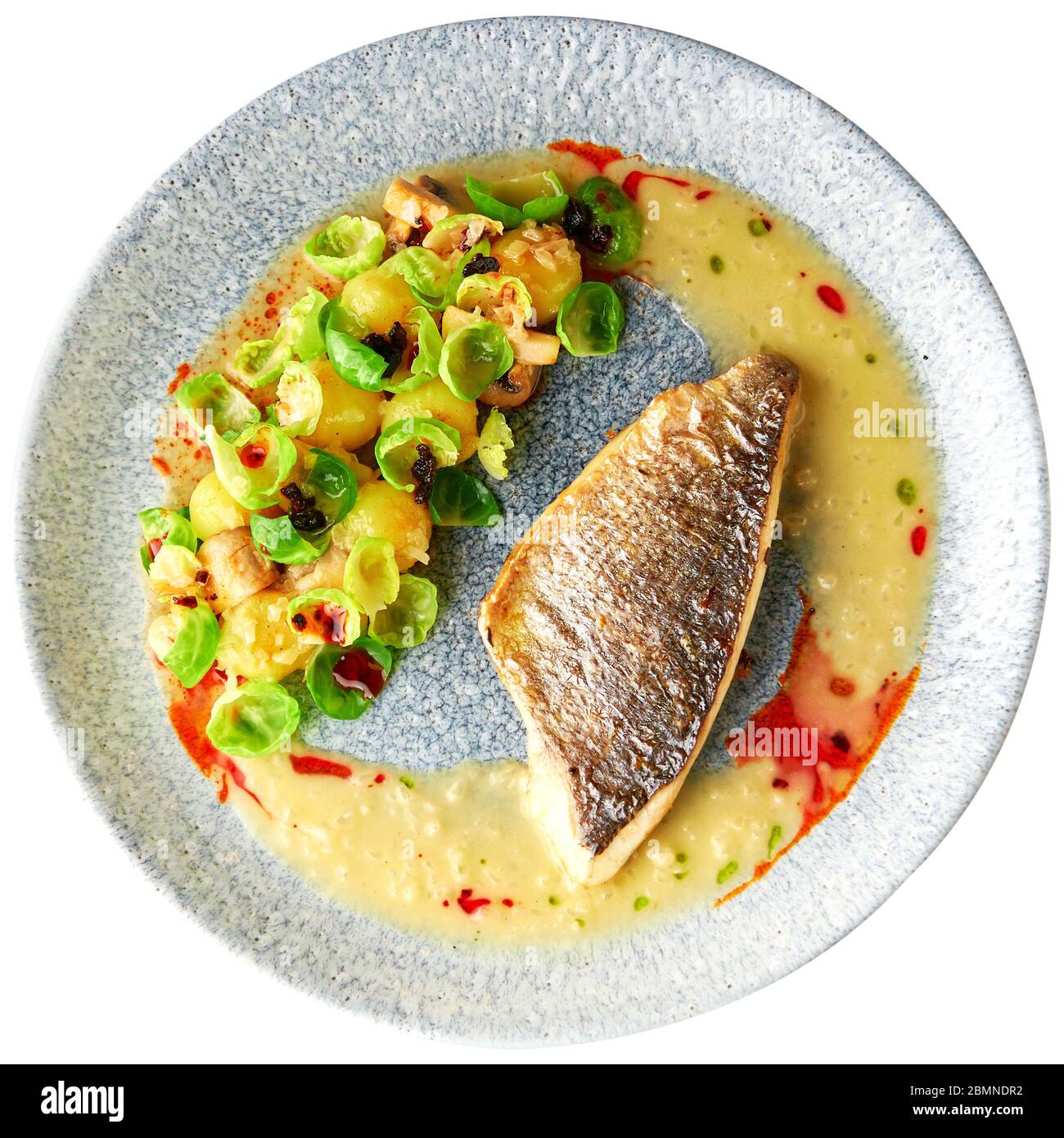 Tasty grilled sea bass fillet served with steamed brussel sprouts ...