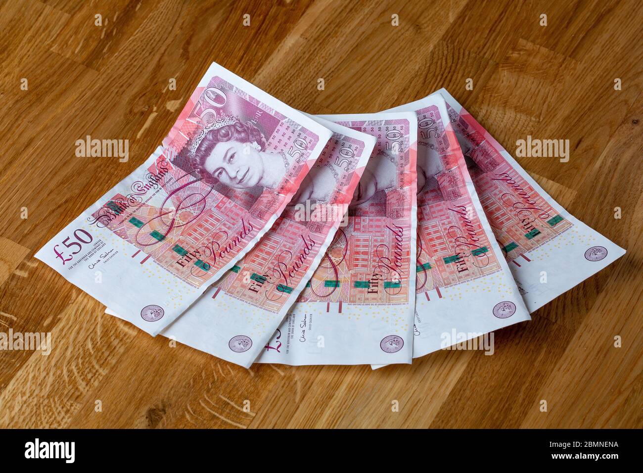 Wad fifty pound notes hi-res stock photography and images - Alamy