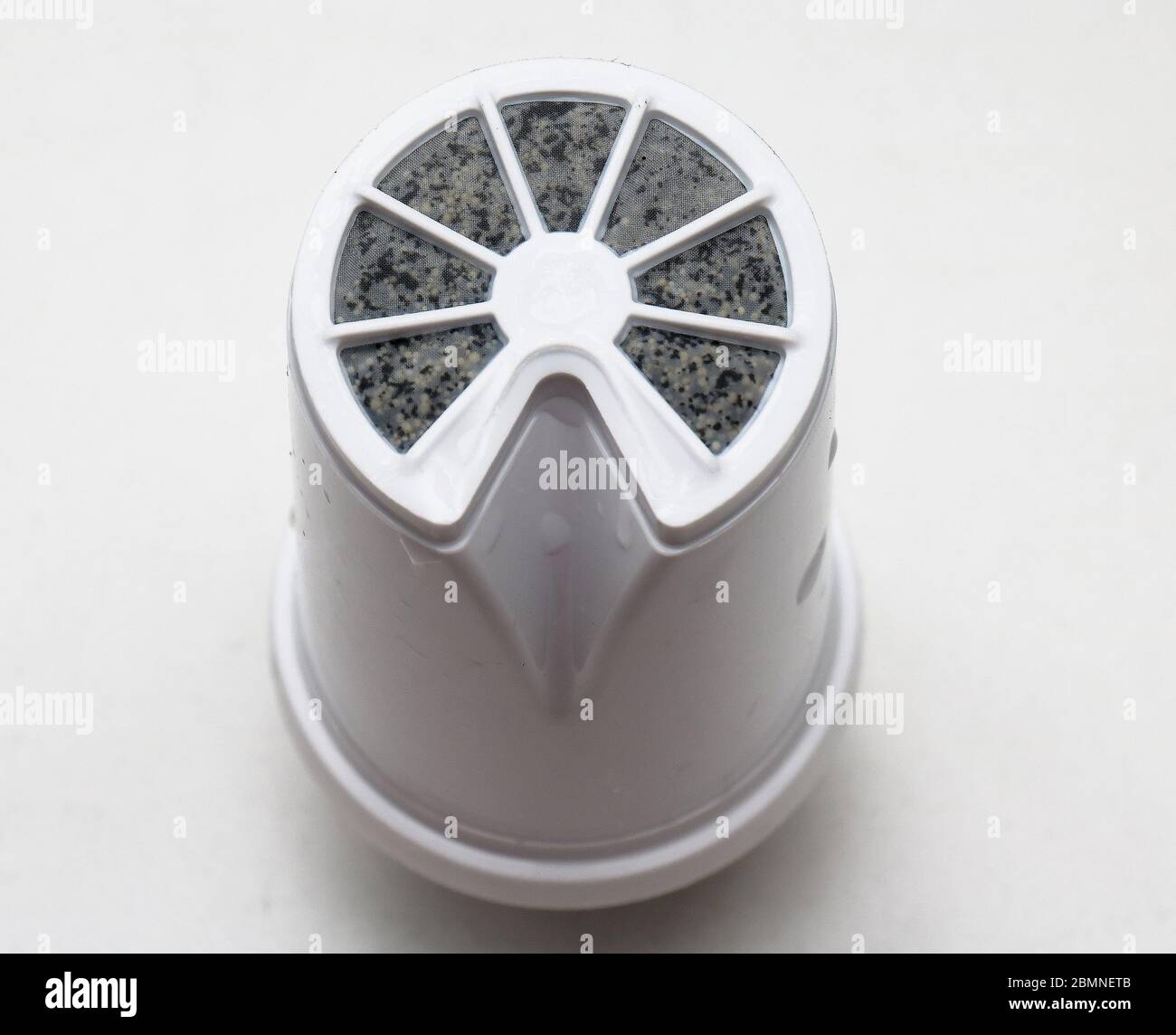 Plastic pitcher purification filter on white background Stock Photo - Alamy