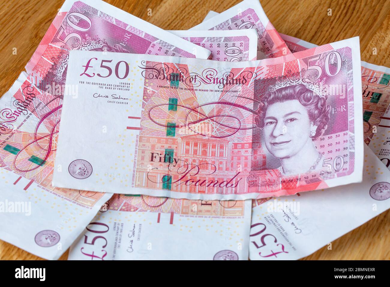 Fifty pound notes stacked up, Fifty pound Stock Photo - Alamy