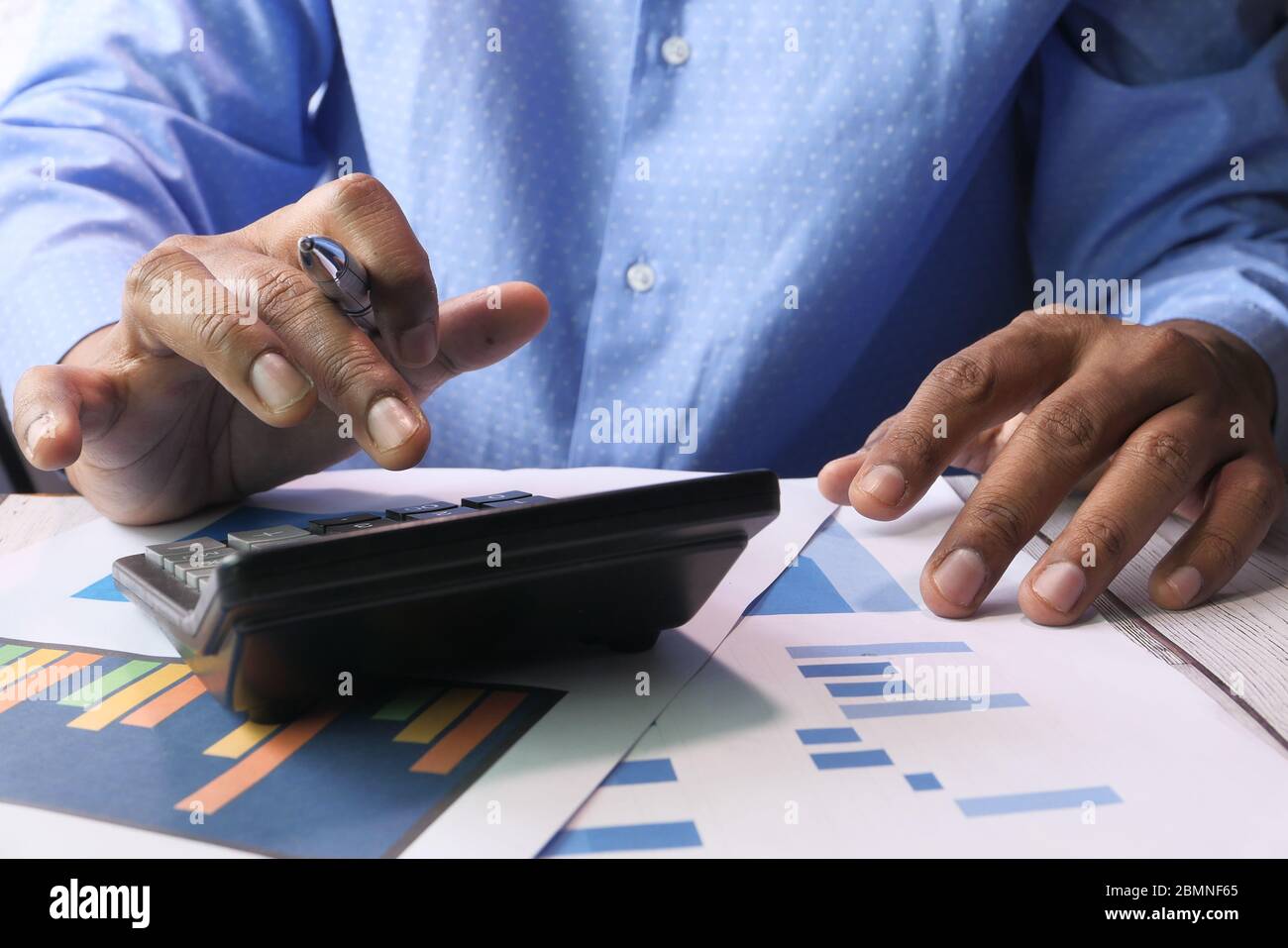 Businessman using laptop financial graph hi-res stock photography and ...