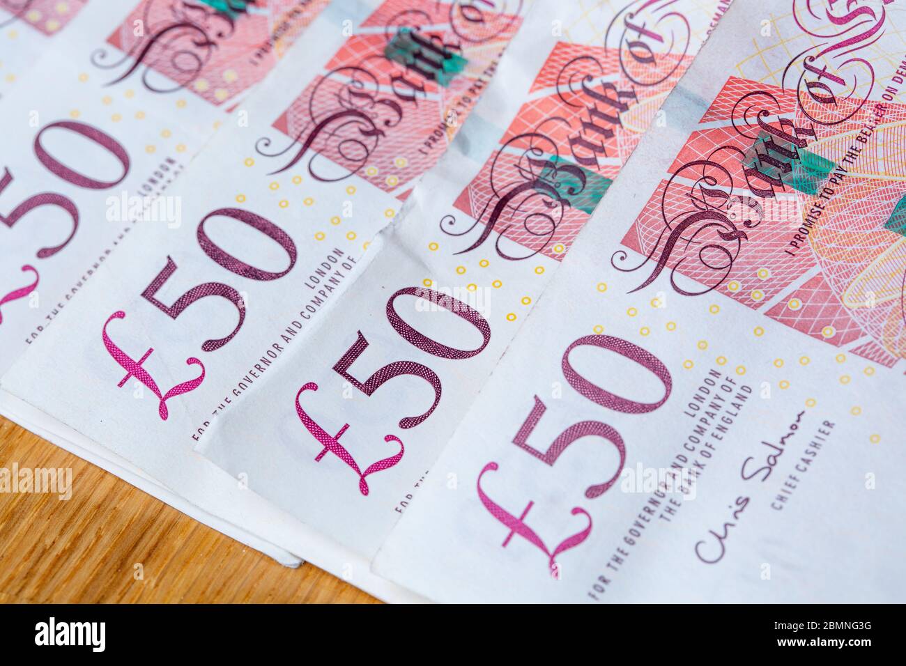 Fifty pound notes stacked up, £50 notes pound sterling Stock Photo - Alamy