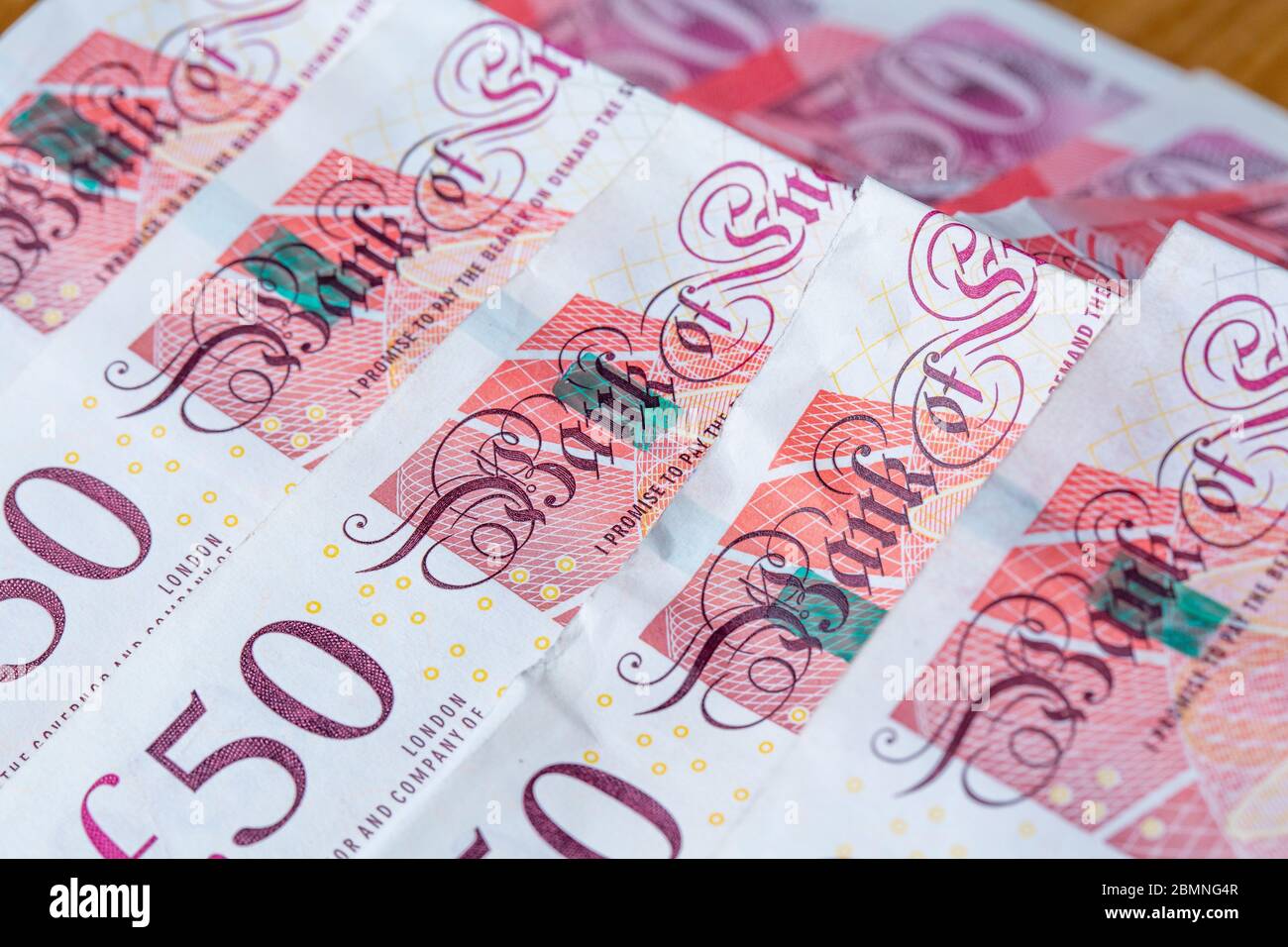 British notes stacked hi-res stock photography and images - Alamy