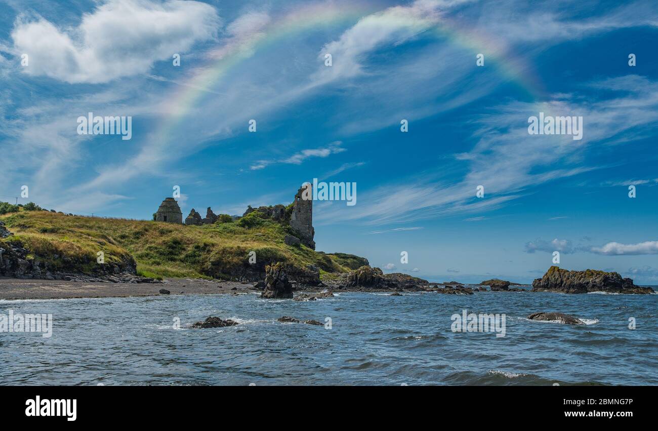 Dunure Rugged sea defences, its ancient castle ruins and a rainbow ...