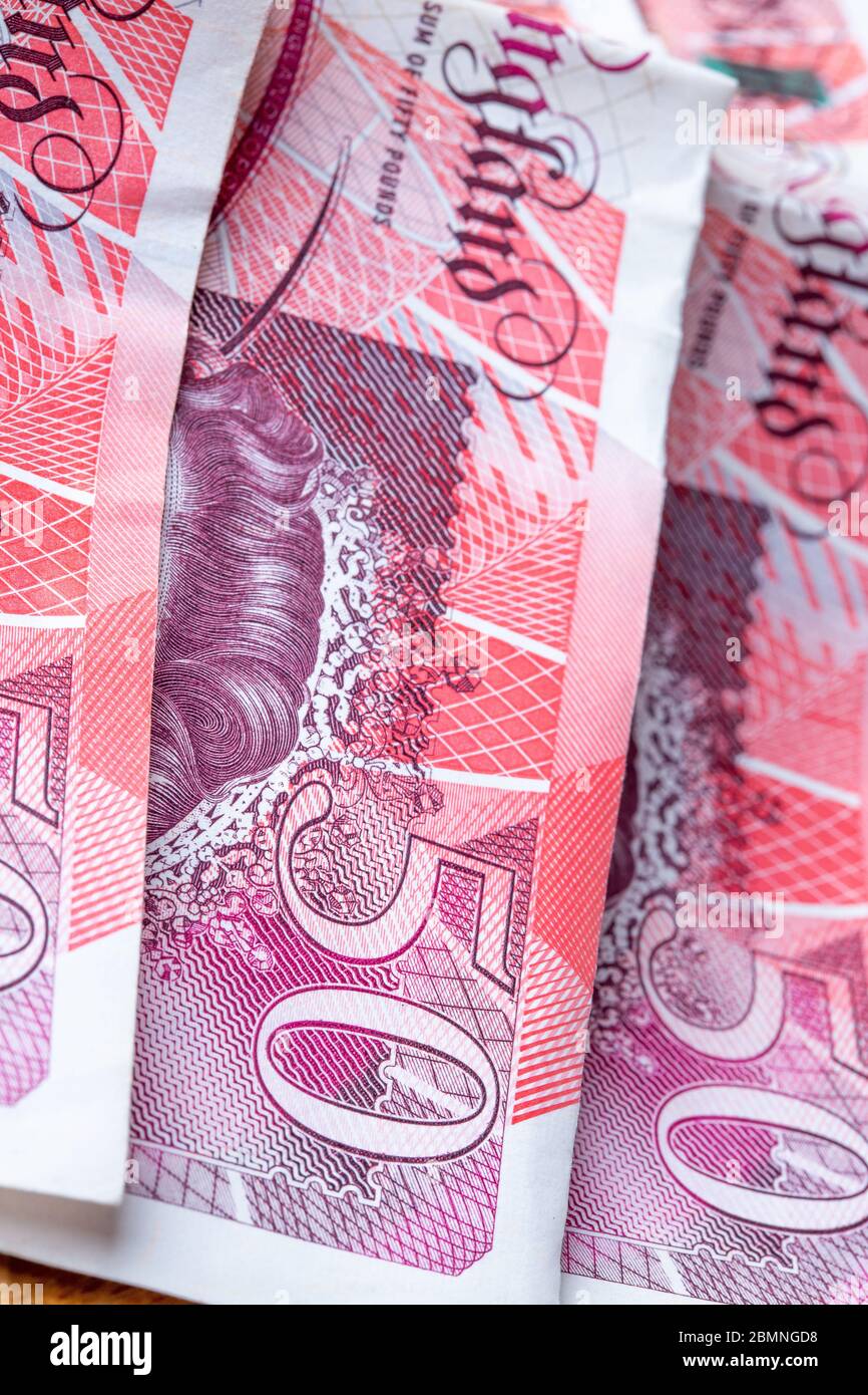 Fifty pound notes stacked up, £50 notes pound sterling Stock Photo - Alamy