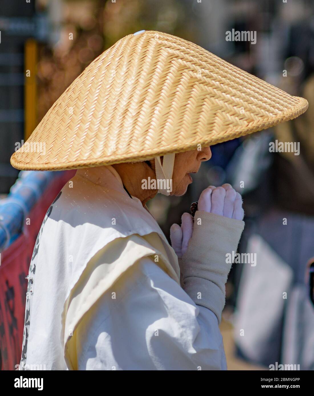 Buddhist monk on pilgrimage praying in a Buddhist temple in Kyoto ...