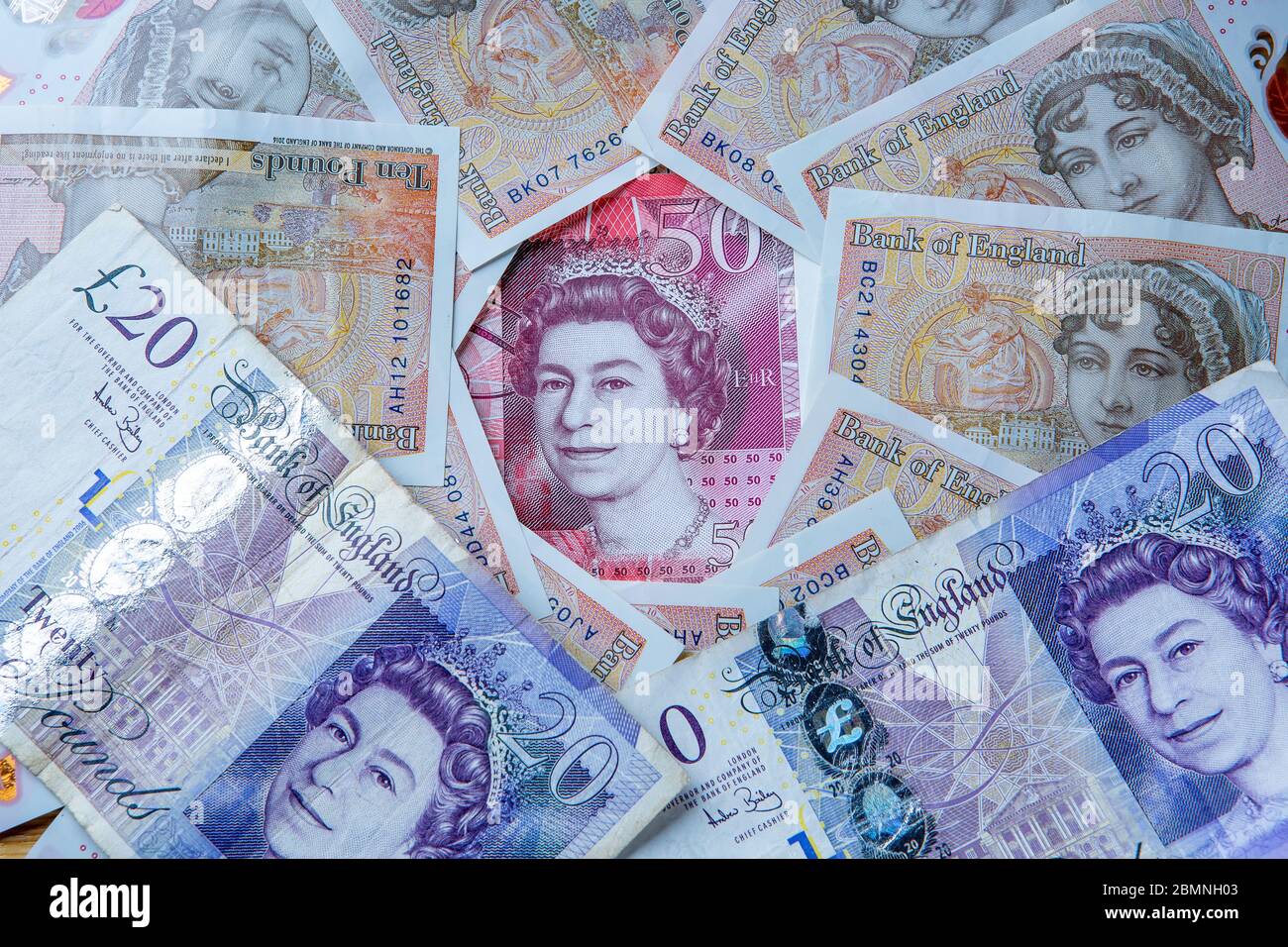 Wad of twenty pound notes hi-res stock photography and images - Alamy