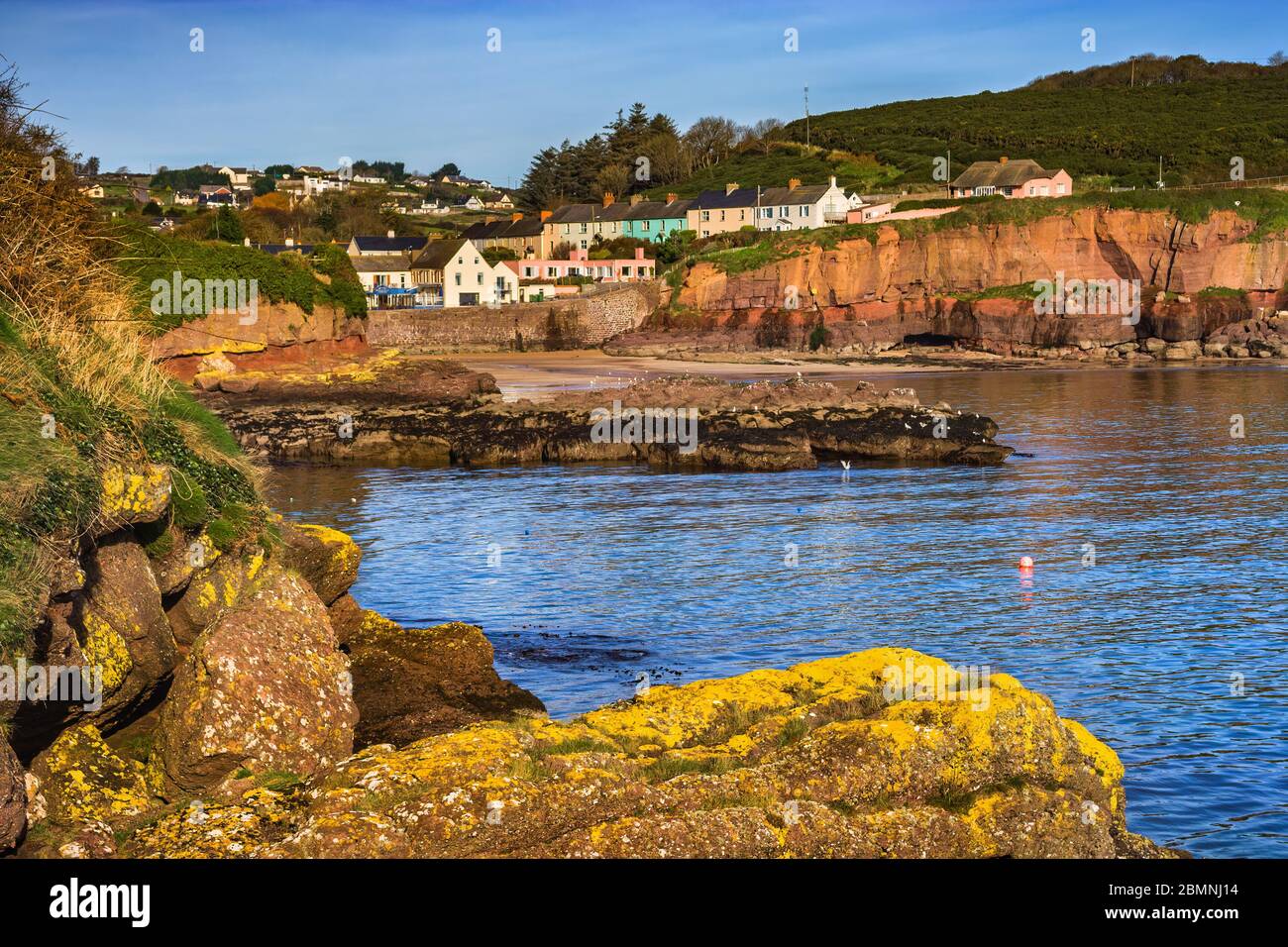 Town of Dunmore East and scenic sea coast in Ireland, County Waterford ...