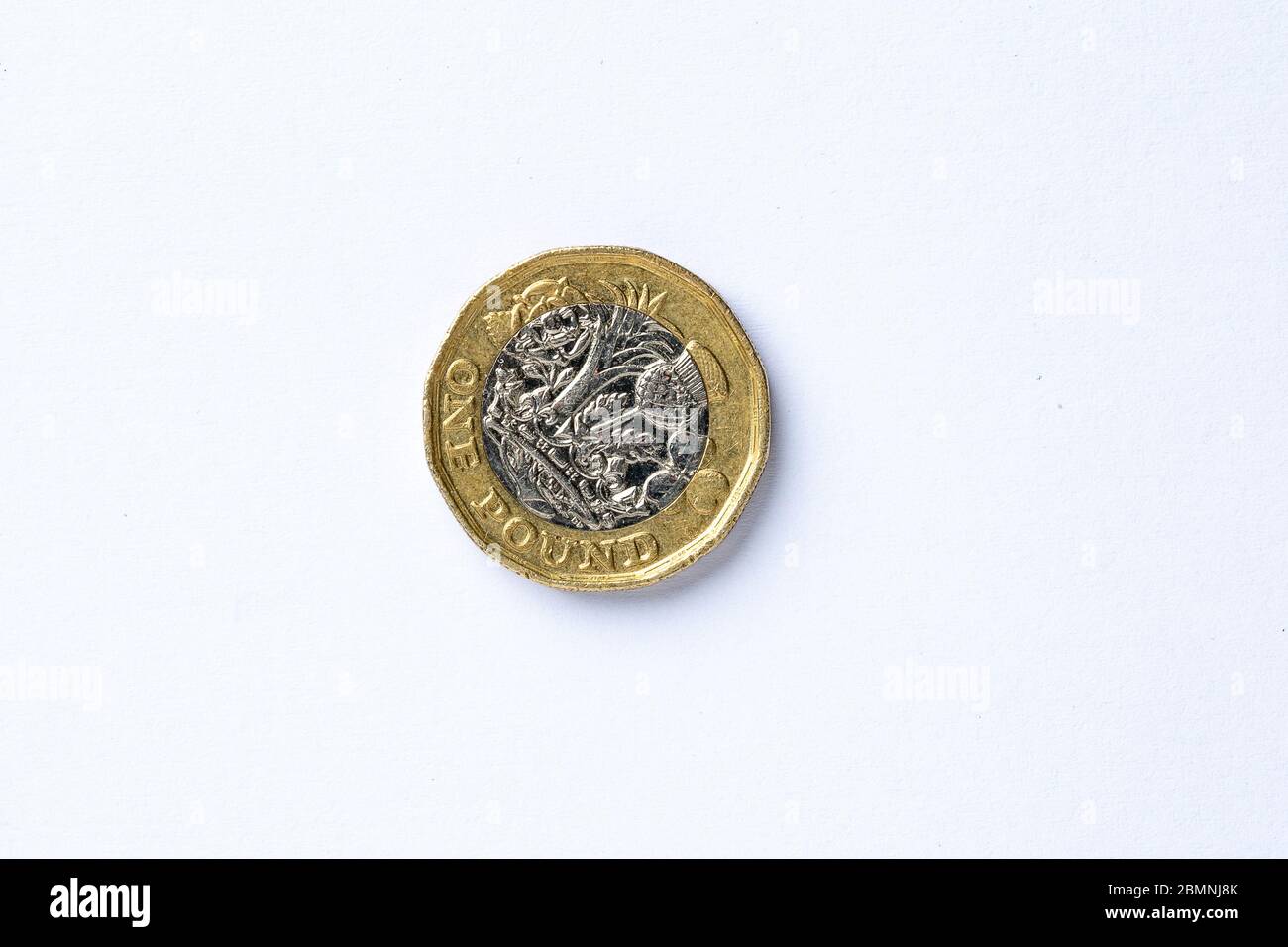 One pound coin on a white background Stock Photo - Alamy